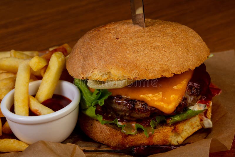 Tasty homemade burger stock image. Image of paper, gourmet - 126776513