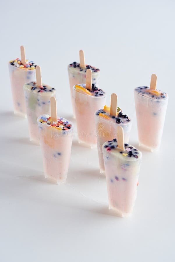 Tasty Homemade Popsicles with Sticks in Containers Stock Photo - Image ...