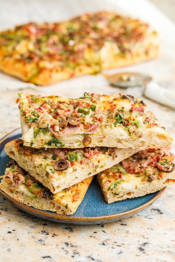 Tasty Italian Square Pizza on Kitchen Table Stock Image - Image of ...