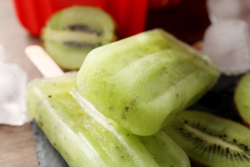 Tasty Kiwi Ice Pops on Table, Closeup. Fruit Popsicle Stock Image ...