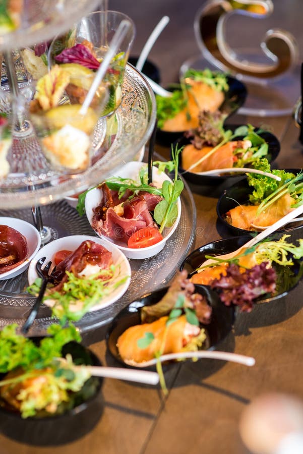 Tasty Little Snacks with Meat and Vegetables on Served Table at the ...