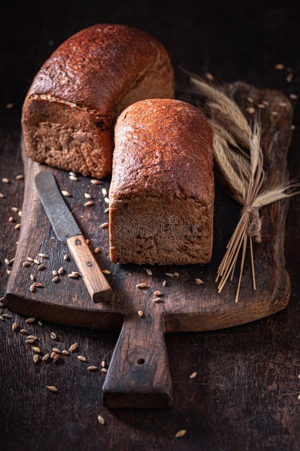 Tasty Loaf of Breads with Grain and Ears Stock Image - Image of ...