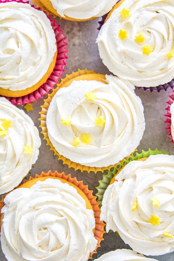 Tasty Looking Cupcakes of Different Colors Stock Image - Image of cream ...