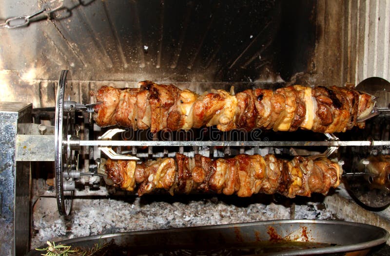 Tasty Meat Cooked in the Fireplace with the Spit 2 Stock Photo - Image ...