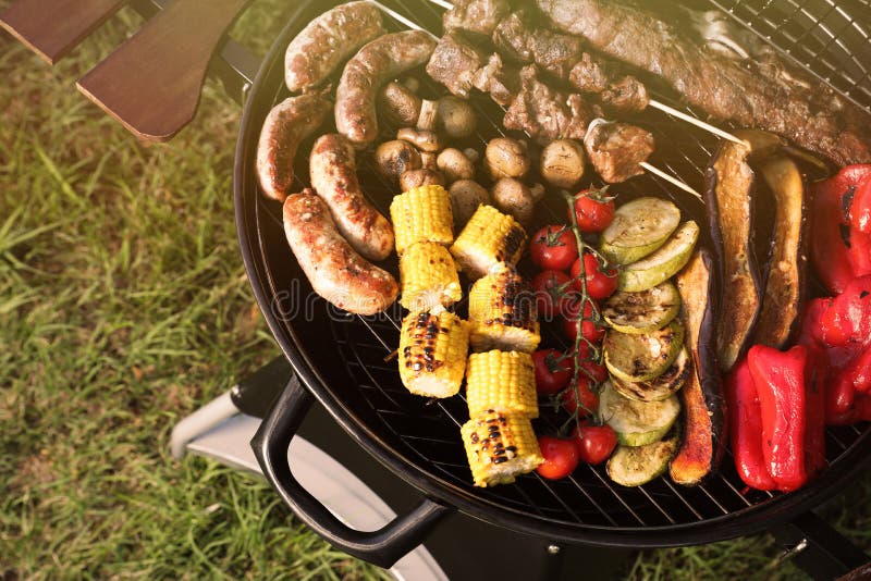Tasty Meat and Vegetables on Barbecue Grill, Top View Stock Photo ...