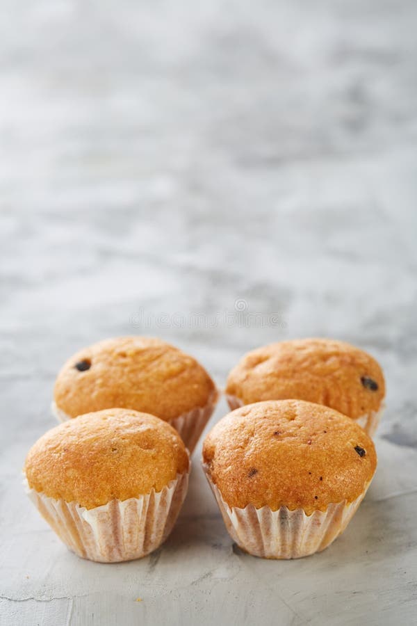 Tasty Muffins Arranged in Pattern on Light Textured Background, Close ...
