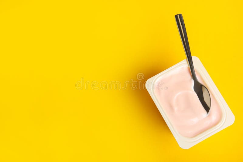 Tasty Organic Yogurt on Yellow, Top View. Space for Text Stock Image ...
