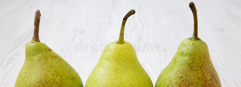 Tasty Pears on a White Wooden Surface, Side View. Close-up Stock Image ...