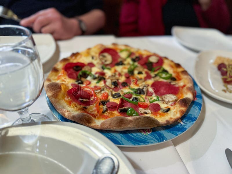 Tasty Pepperoni Pizza with Basil on Grey Table Stock Image - Image of ...