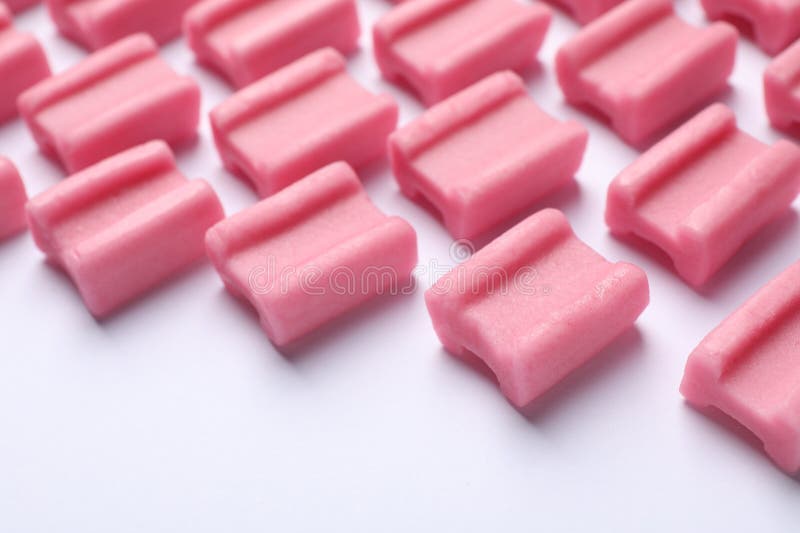 Tasty Pink Chewing Gums on White Background, Closeup Stock Photo ...