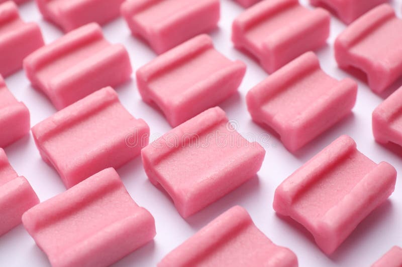 Tasty Pink Chewing Gums on White Background, Closeup Stock Photo ...