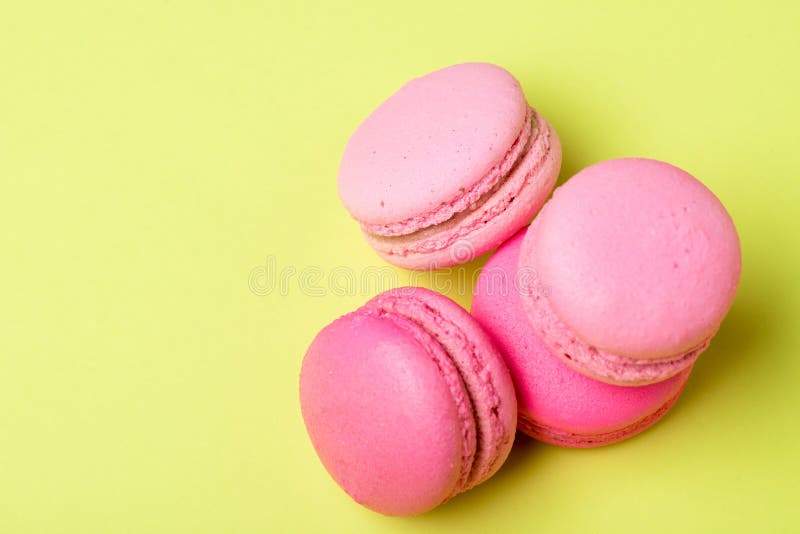 Pink Macarons with Filling on Yellow Surface Stock Image - Image of ...