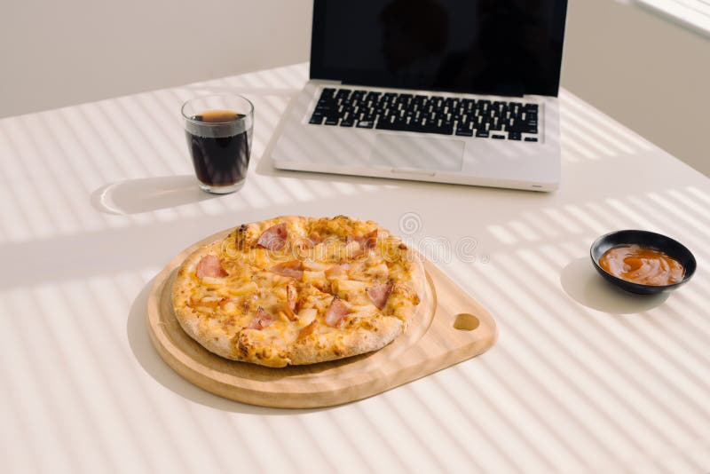 Tasty Pizza On Office Desk With Coke And Laptop, Fast Food Stock Photo ...