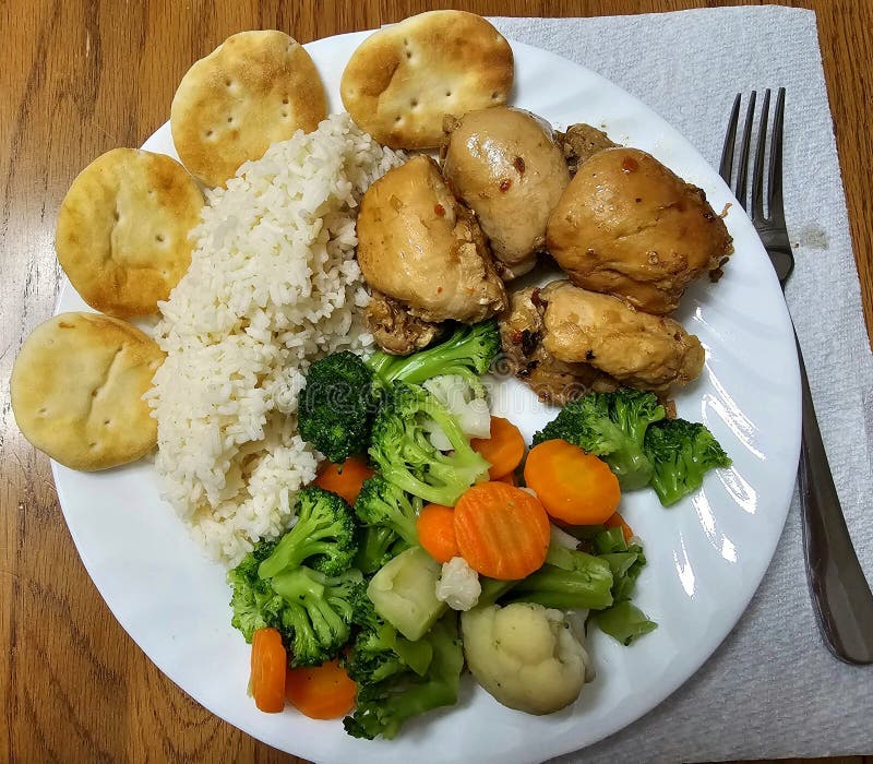 A Tasty Plate with Chicken Thighs, Rice, Mixed Vegetables, and Naan Stock Image - Image of rice ...