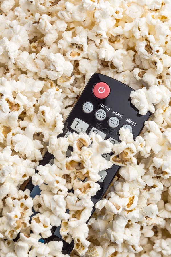 Tasty Popcorn and Tv Remote Control. Stock Image - Image of screen ...