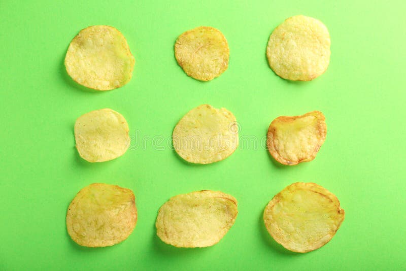 Tasty Potato Chips on Color Background Stock Photo - Image of delicious ...