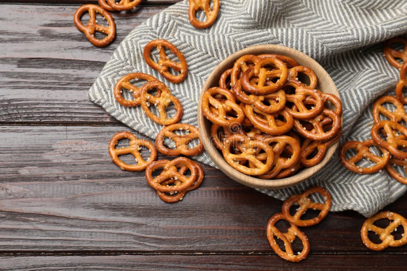 Tasty Pretzel Crackers on Wooden Table, Top View. Space for Text Stock ...
