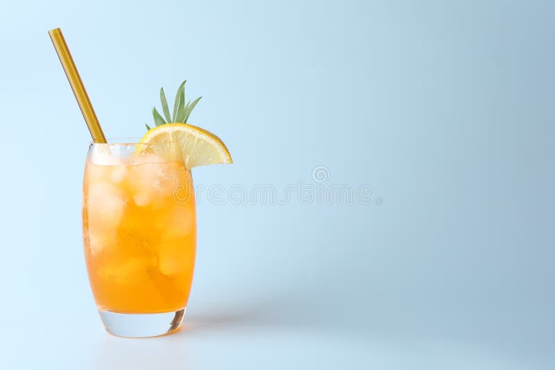 Tasty Refreshing Drink with Straw in Glass on Light Blue Background ...