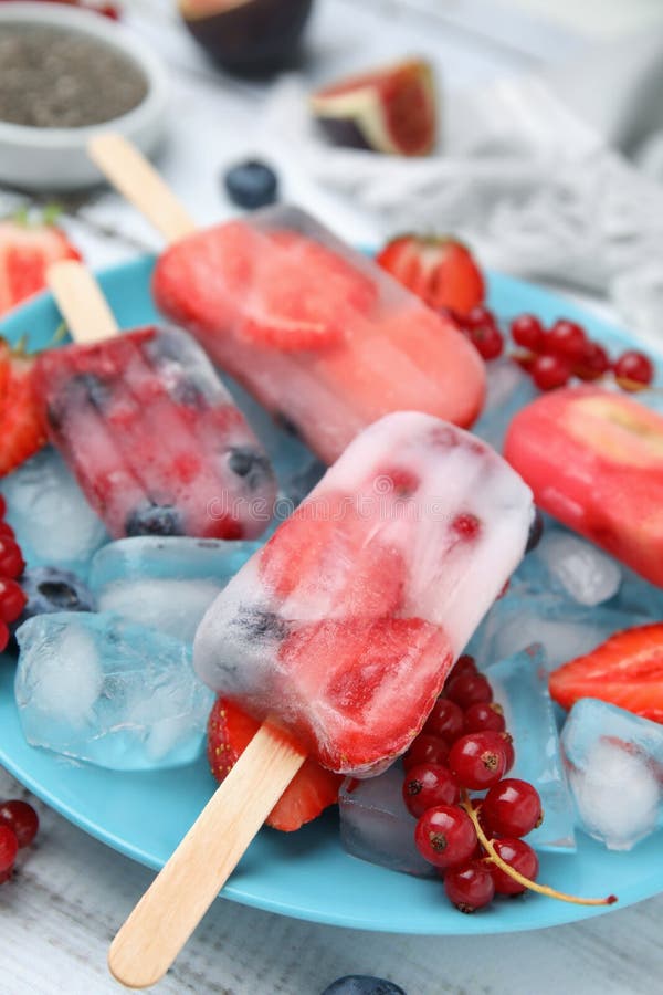 Tasty Refreshing Fruit and Berry Ice Pops on Plate, Closeup Stock Photo ...