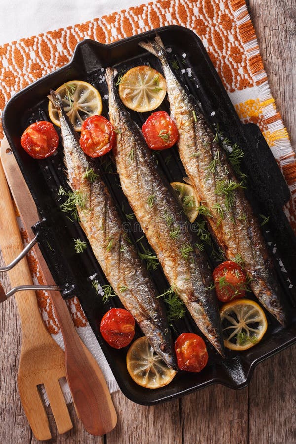 Tasty Saury Fish on the Grill Pan Close-up. Vertical Top View Stock ...