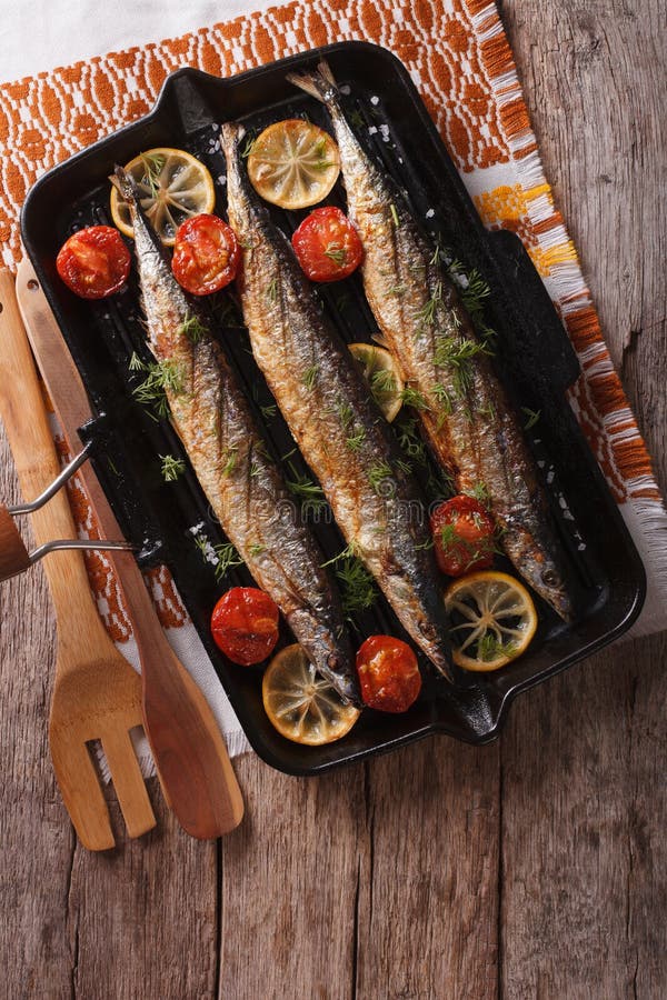 Tasty Saury Fish on the Grill Pan. Vertical Top View Stock Image ...