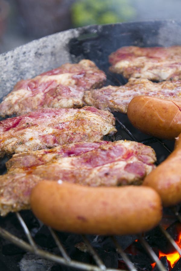 Tasty sausages on a bbq stock photo. Image of cooking - 24704962