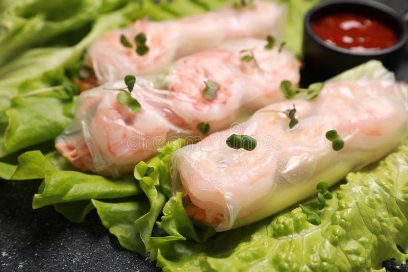 Tasty Spring Rolls Served with Lettuce and Microgreens on Grey Textured ...