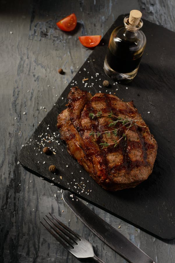 Tasty Stake Against a Black Background Stock Image - Image of ...