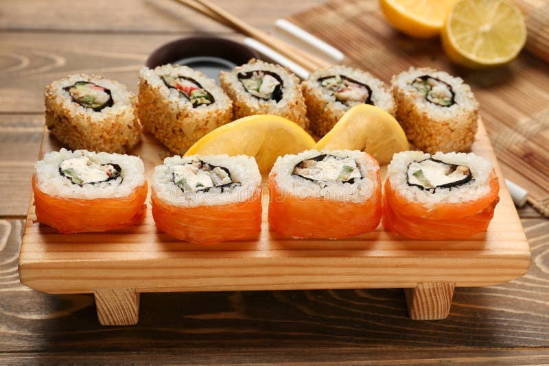 Tasty Sushi on Wooden Stand Stock Photo - Image of cook, dish: 151350940