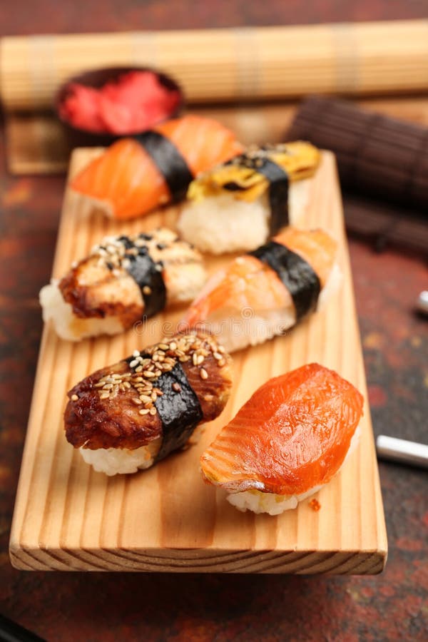 Tasty Sushi on Wooden Stand Stock Image - Image of eating, menu: 151352997