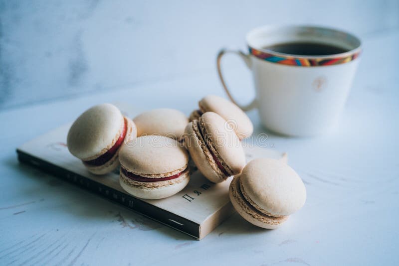 Tasty Sweet Raspberry Macarons with a Cup of Coffee Stock Photo - Image ...