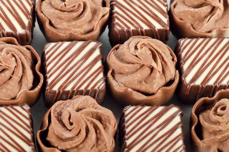 Tasty Sweets from a Milk Chocolate Stock Photo - Image of black, candy ...
