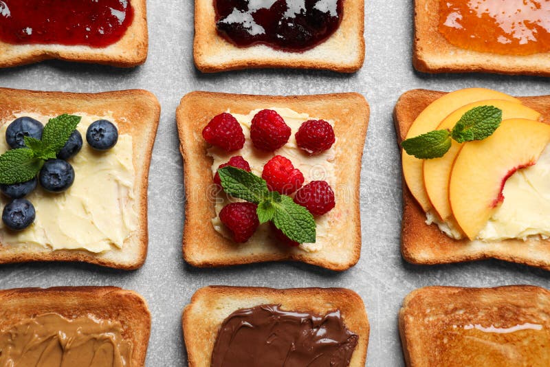 Tasty Toasts with Different Spreads and Fruits on Light Grey Table ...