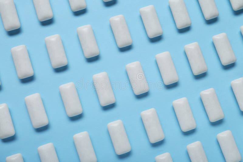 Tasty White Chewing Gums on Light Blue Background, Flat Lay Stock Image ...