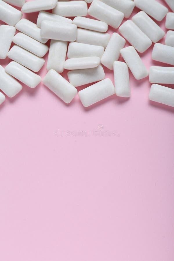 Tasty White Chewing Gums on Pale Pink Background, Flat Lay. Space for ...