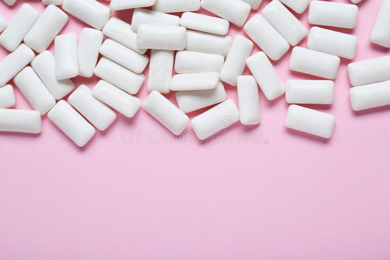 Tasty White Chewing Gums on Pale Pink Background, Flat Lay. Space for ...