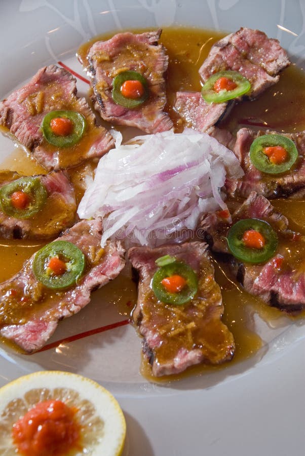 Carpaccio Chamuscado De La Carne De Vaca Imagen de archivo - Imagen de ...