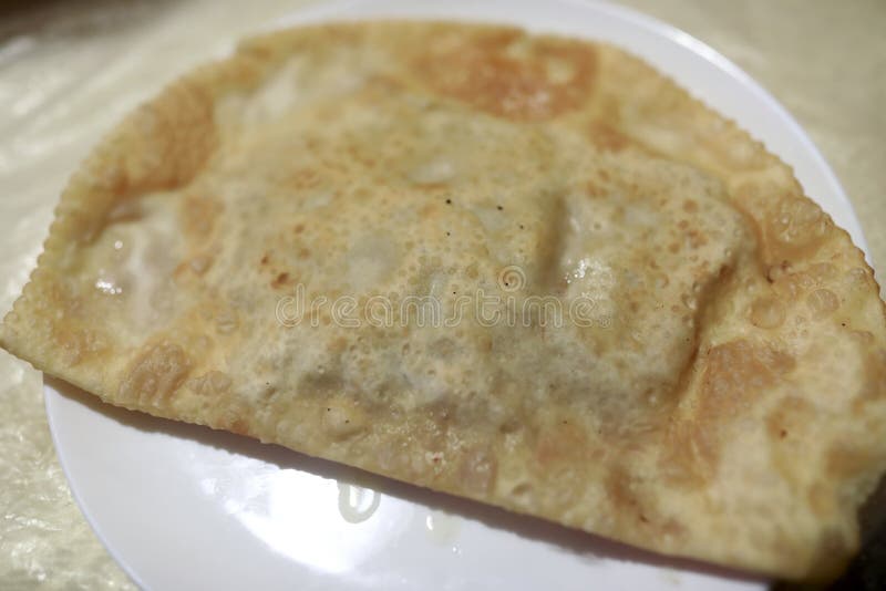 Tatar cheburek on plate stock image. Image of cuisine - 215266519