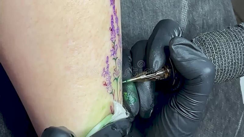 Tattoo Artist Makes a Tattoo To a Client Stock Video - Video of ...