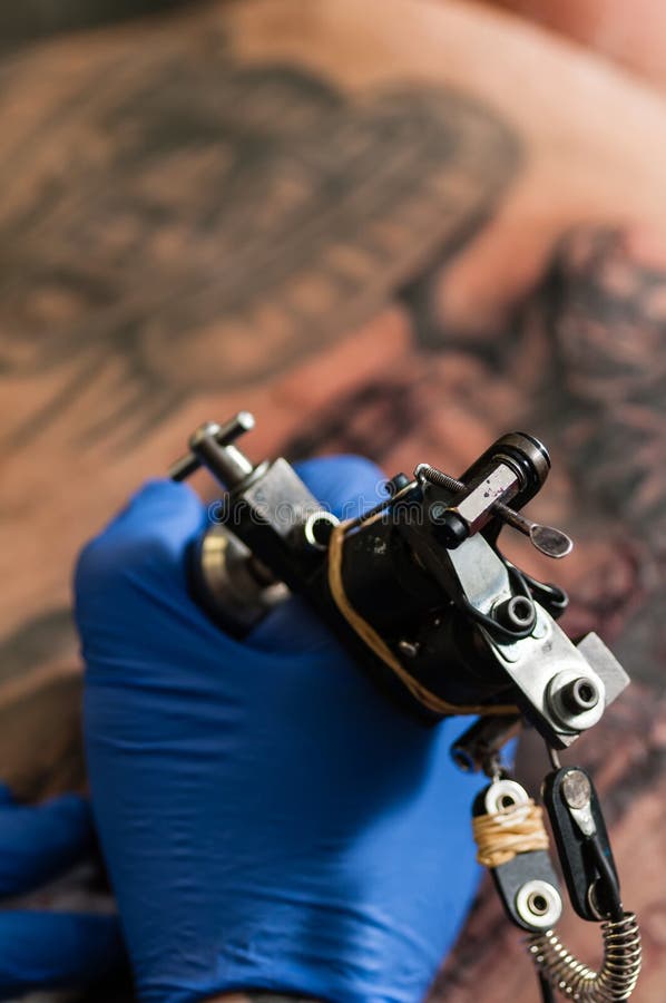 Tattoo Artist Making Tattoo Stock Photo - Image of professional, skin ...