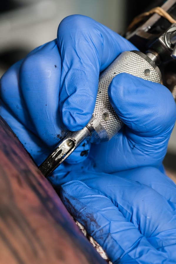 Tattoo Artist Making Tattoo Stock Photo - Image of inking, metal: 85426854