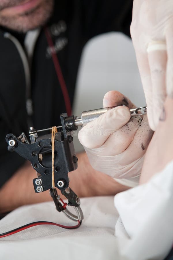 Close View at Tattoo Artist at Work Stock Image - Image of splashes ...