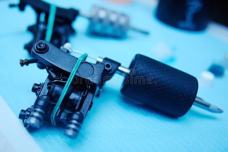 Tattoo Machine on the Background of a Studio Stock Image - Image of ...