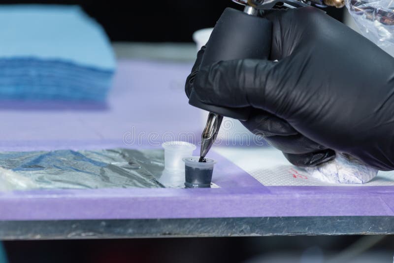 Tattoo Machine Dipping in Ink Stock Image - Image of design, needle ...