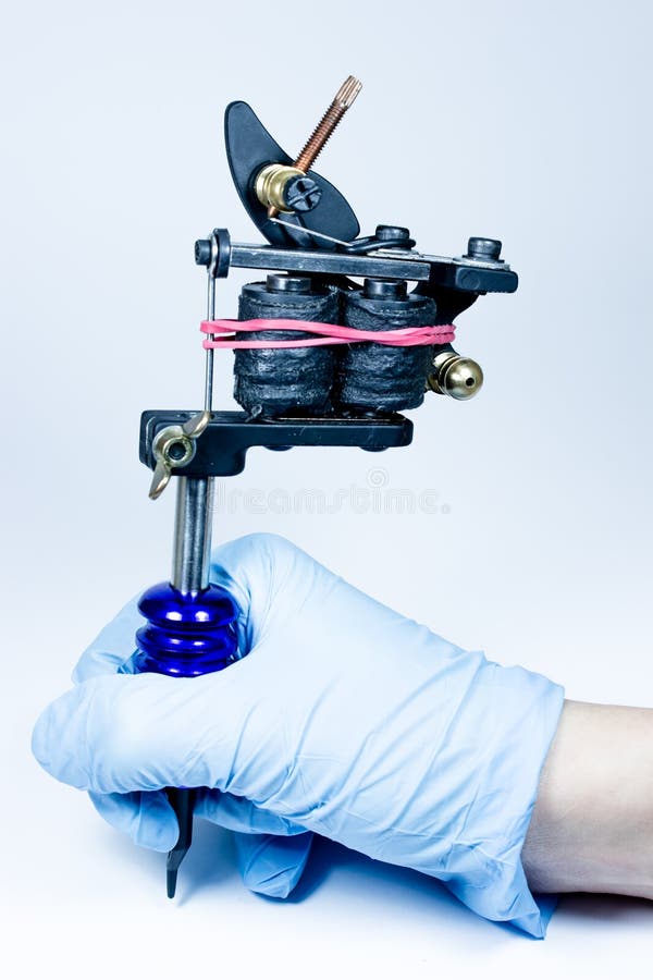Tattoo machine in hand stock photo. Image of hygiene - 60868866