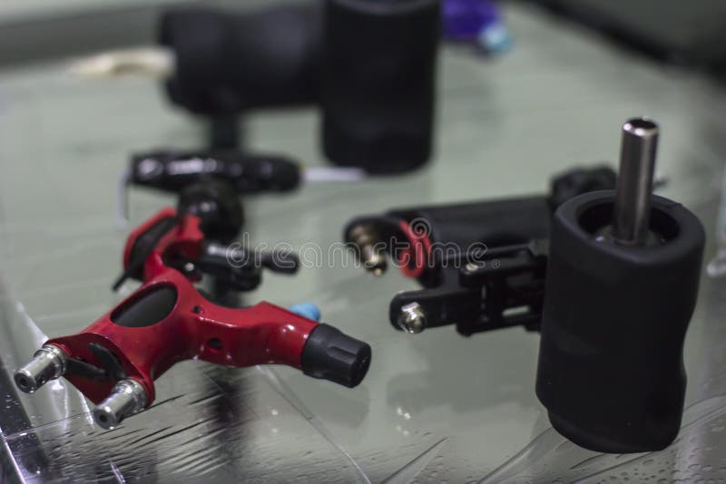Tattoo Machine is on the Table in a Tattoo Studio Closeup Stock Photo ...