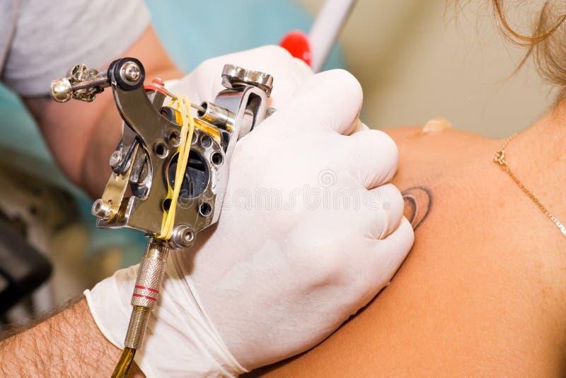 Tattoo making stock photo. Image of people, occupation - 2988576