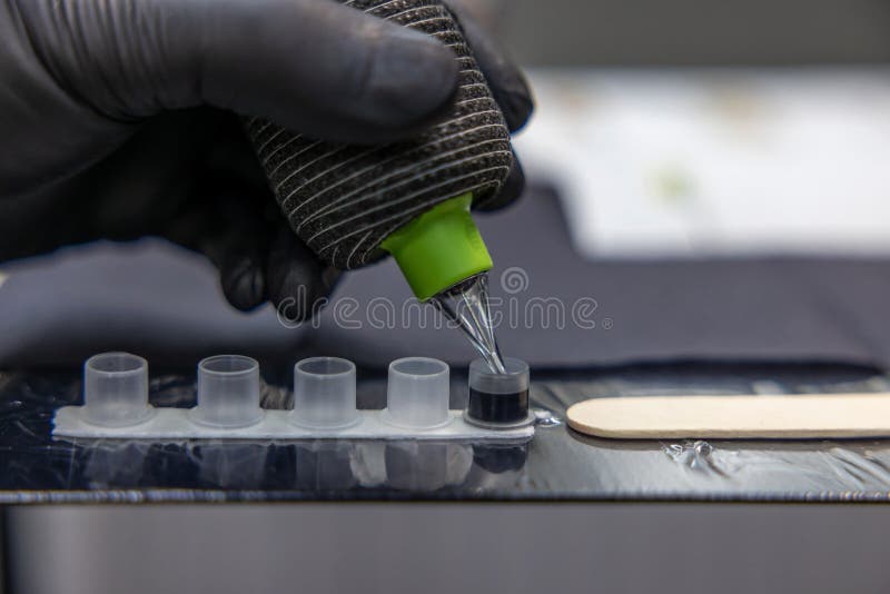 Tattoo Master Preparing Equipment for Tattoo Session Stock Image ...