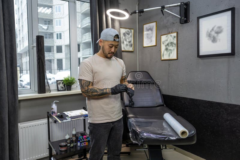 Young Man Preparing for Tattoo Session Stock Image - Image of paint ...