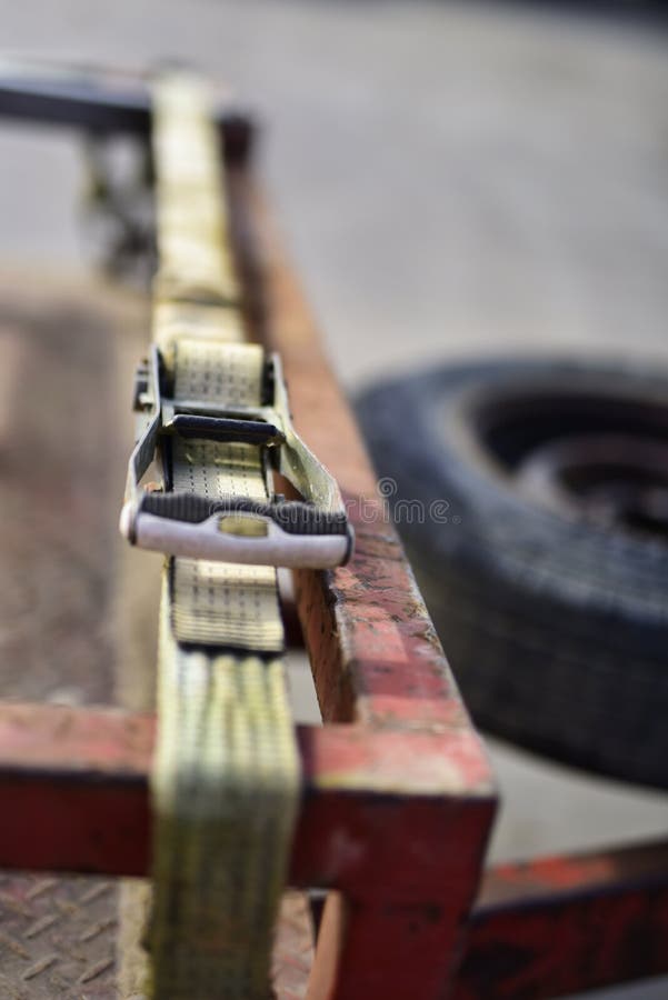 Securing the Load of a Car Transporter,Car Tire Secured with Belt for ...